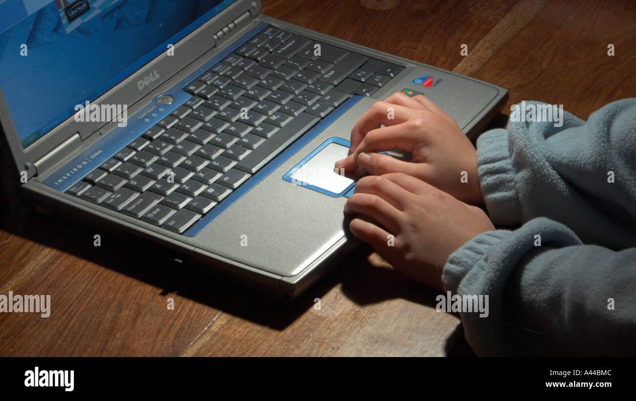 girl child working with laptop computer Stock Photo - Alamy