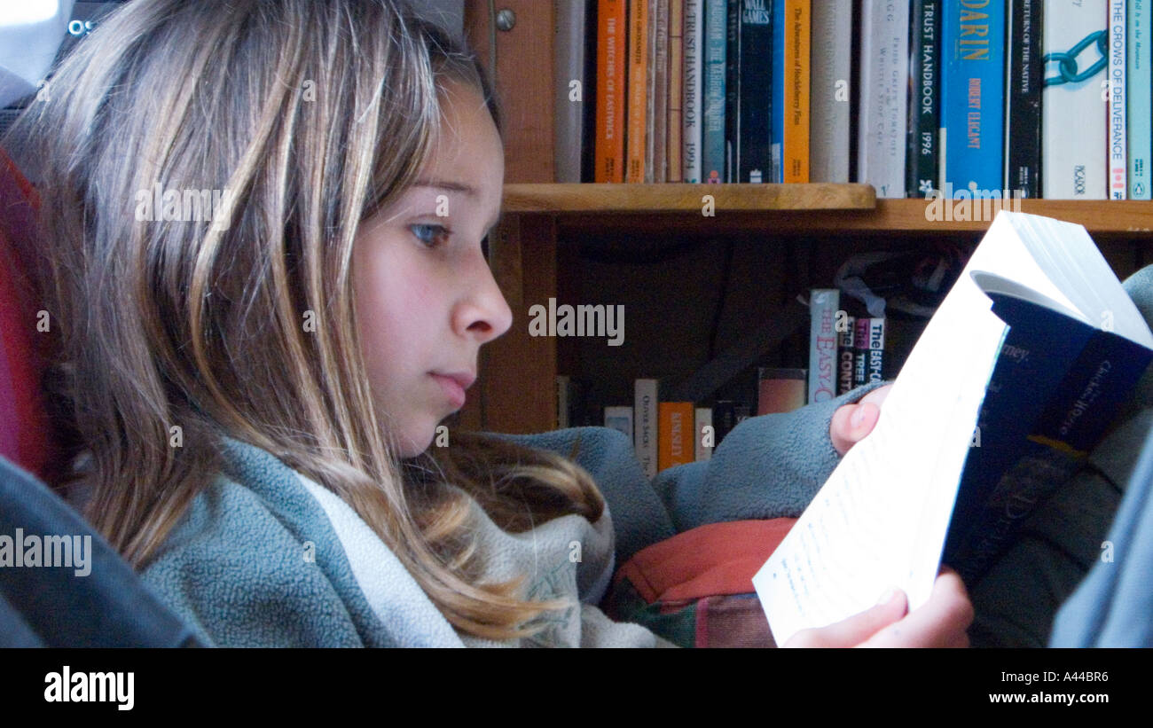 girl child reading book Stock Photo - Alamy