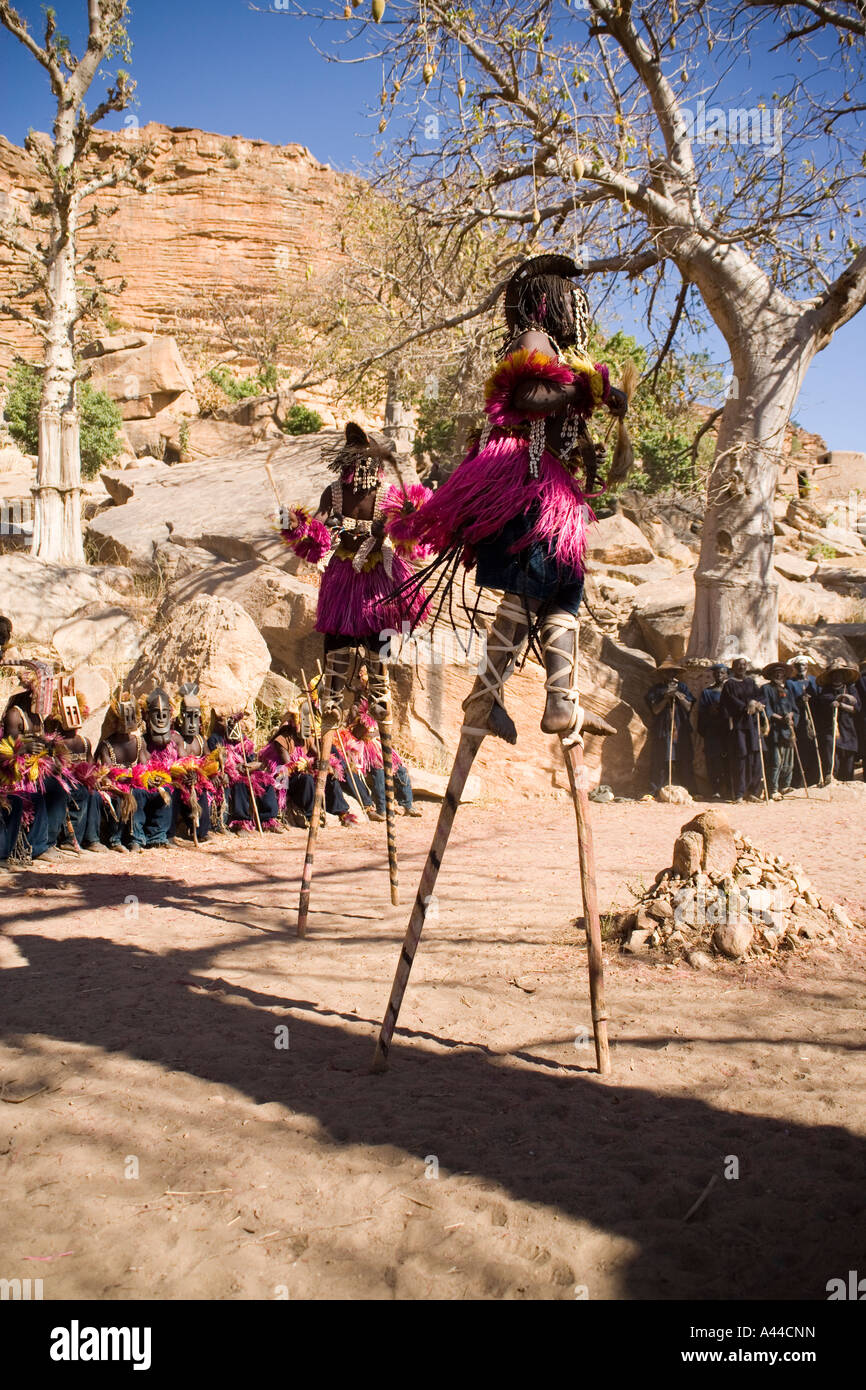 Stilt dancer at the mask dance in the village of Tereli, Dogon Country ...