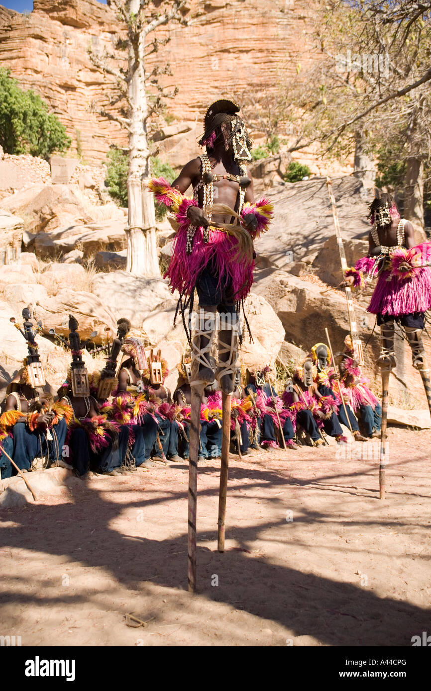 Stilt dancer at the mask dance in the village of Tereli, Dogon Country ...