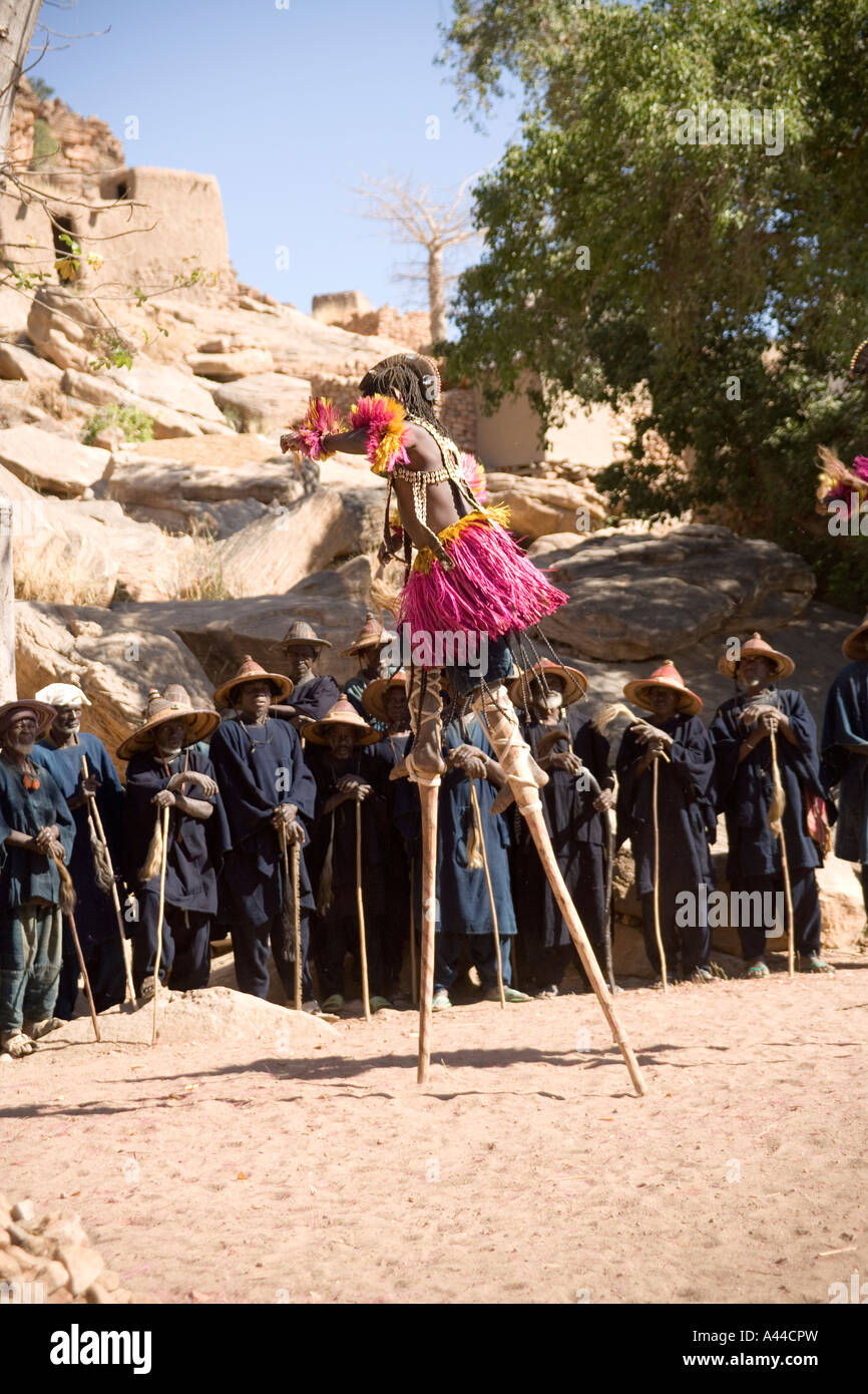 Stilt dancer at the mask dance in the village of Tereli, Dogon Country ...