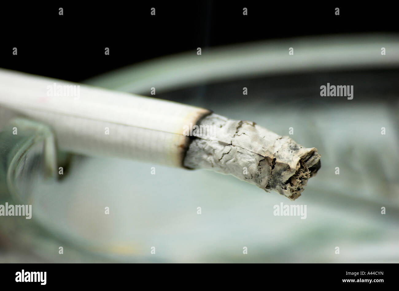 Burning Cigarette Close up Stock Photo - Alamy