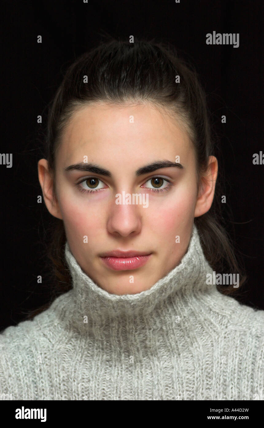 Portrait of a serious young woman Stock Photo - Alamy