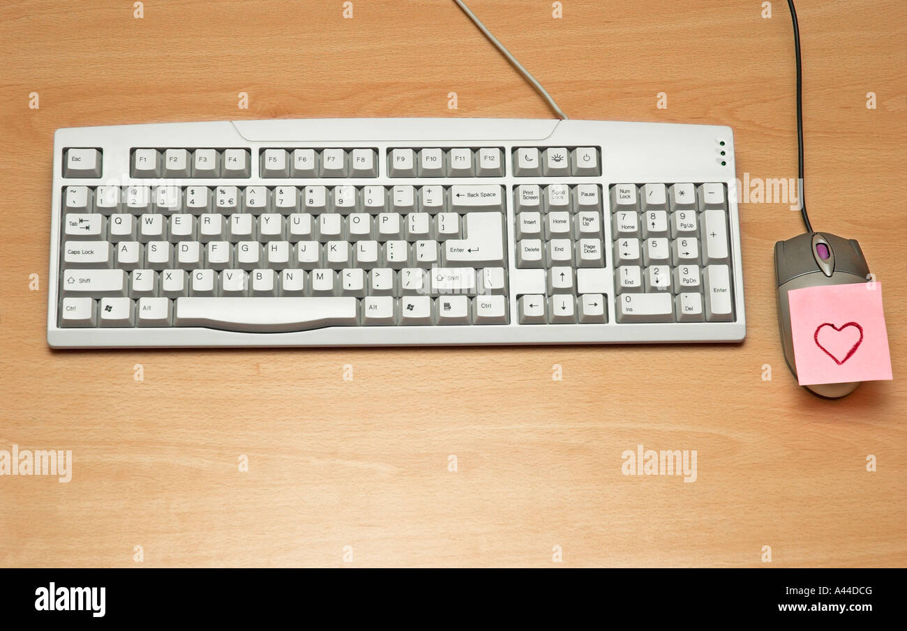 Computer keyboard, computer mouse and heart note Stock Photo - Alamy