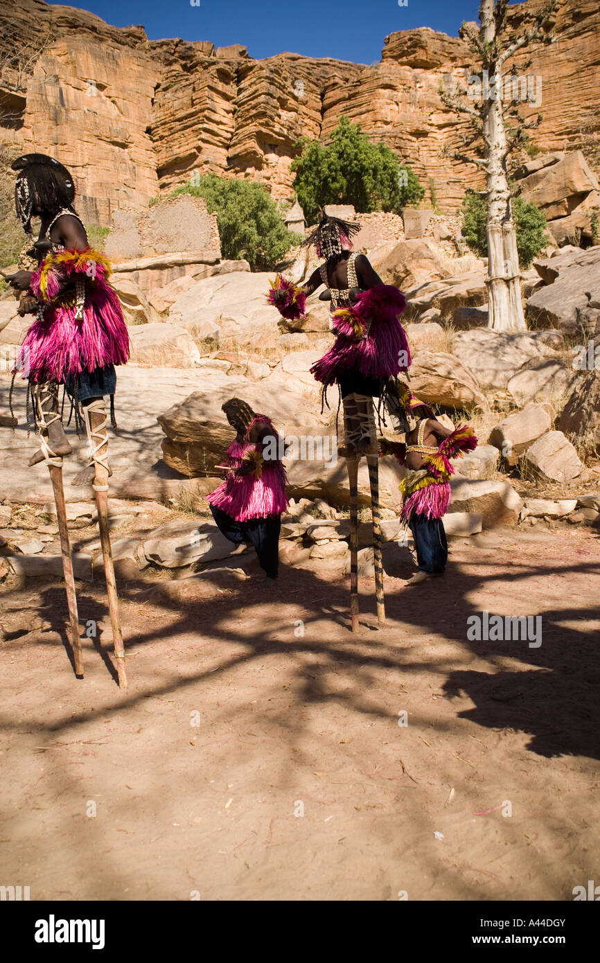 Stilt dancer at the mask dance in the village of Tereli, Dogon Country ...