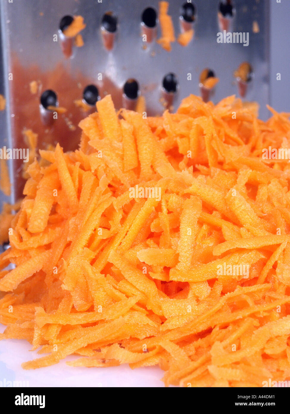 Grating carrots hi-res stock photography and images - Alamy