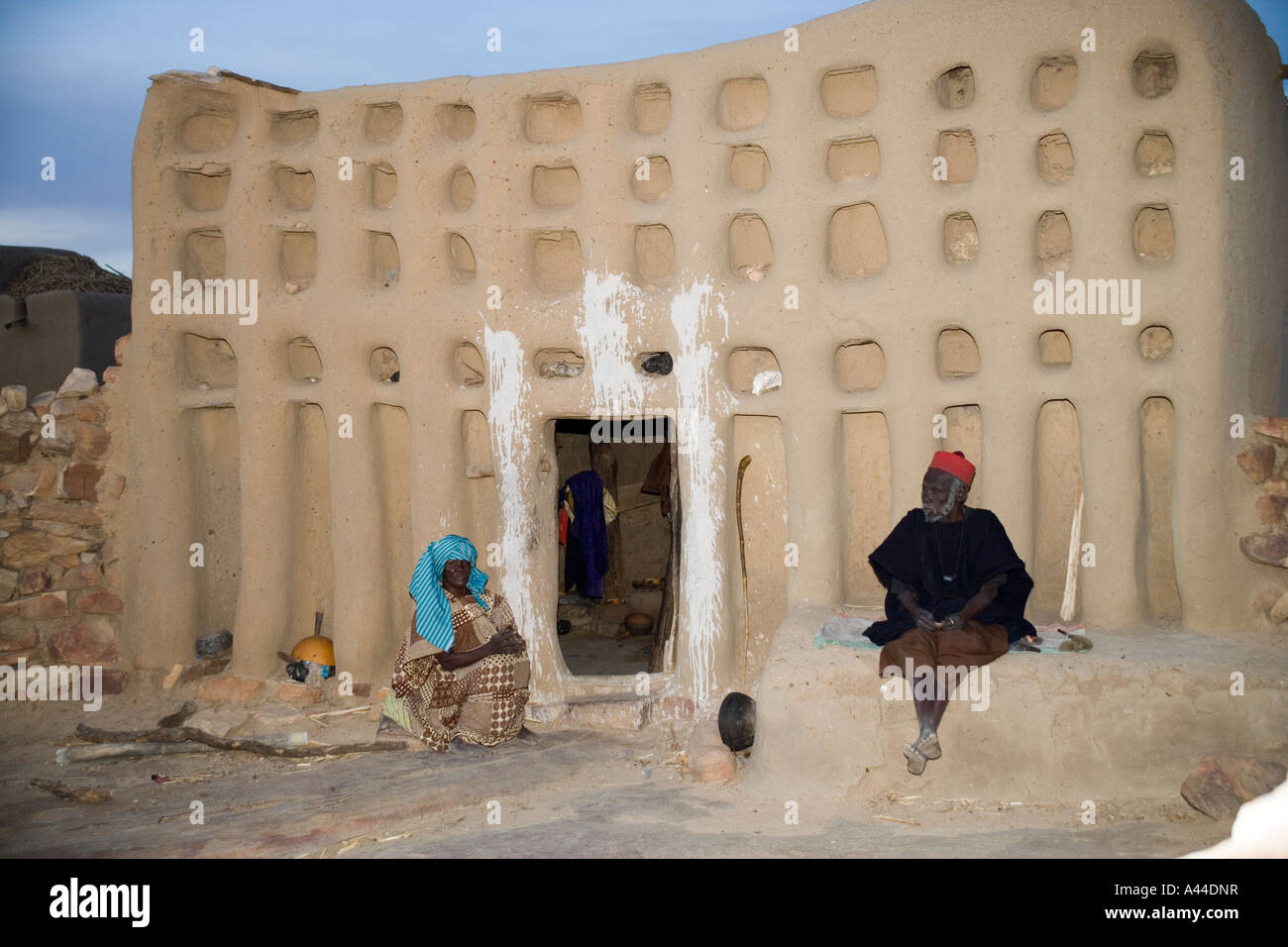 The Binou priest in Sanga and the offerings of millet on the walls of ...