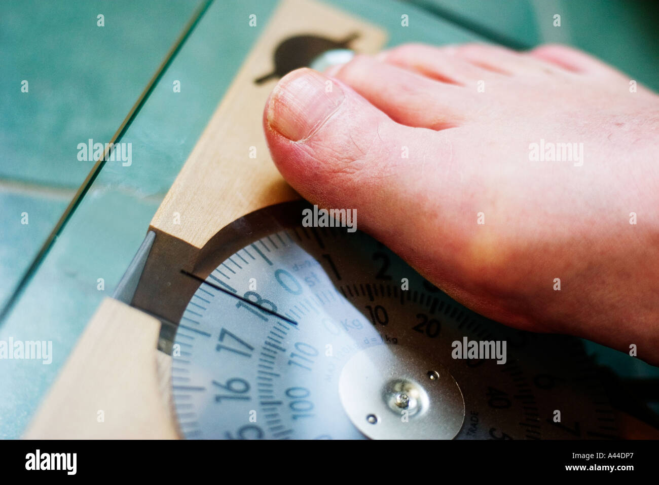 250 Pound 120kg Man Weighs Himself On Bathroom Scales Stock Photo Alamy 250-pound-120kg-man-weighs-himself-on-bathroom-scales-stock-photo-alamy