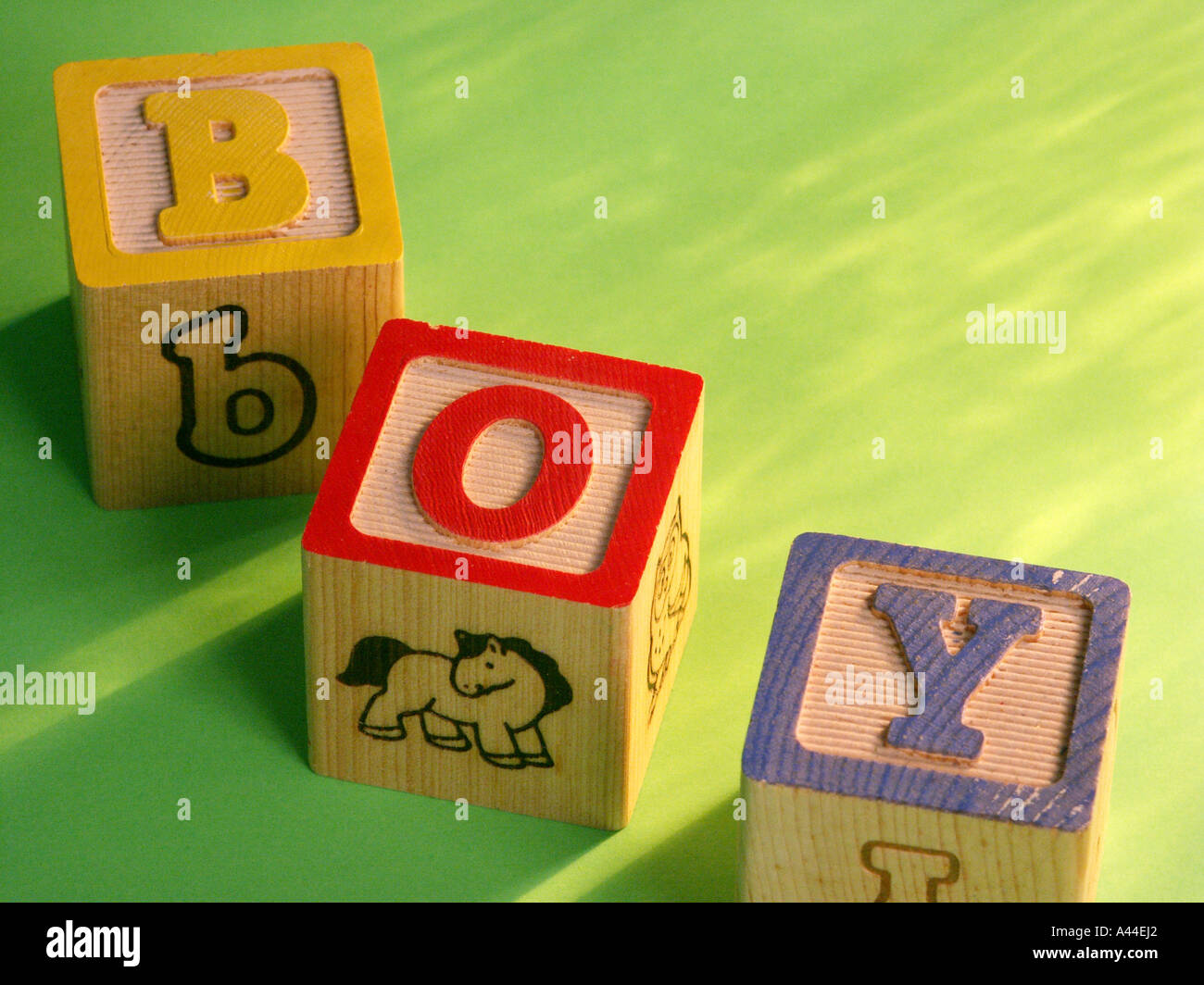 Children playing alphabet blocks hi-res stock photography and images ...