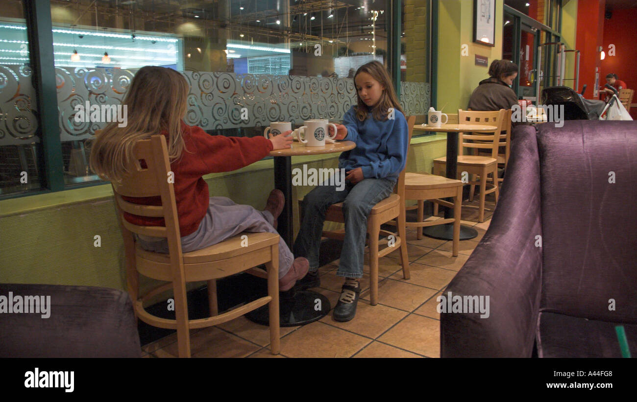 girl children in starbucks Stock Photo - Alamy