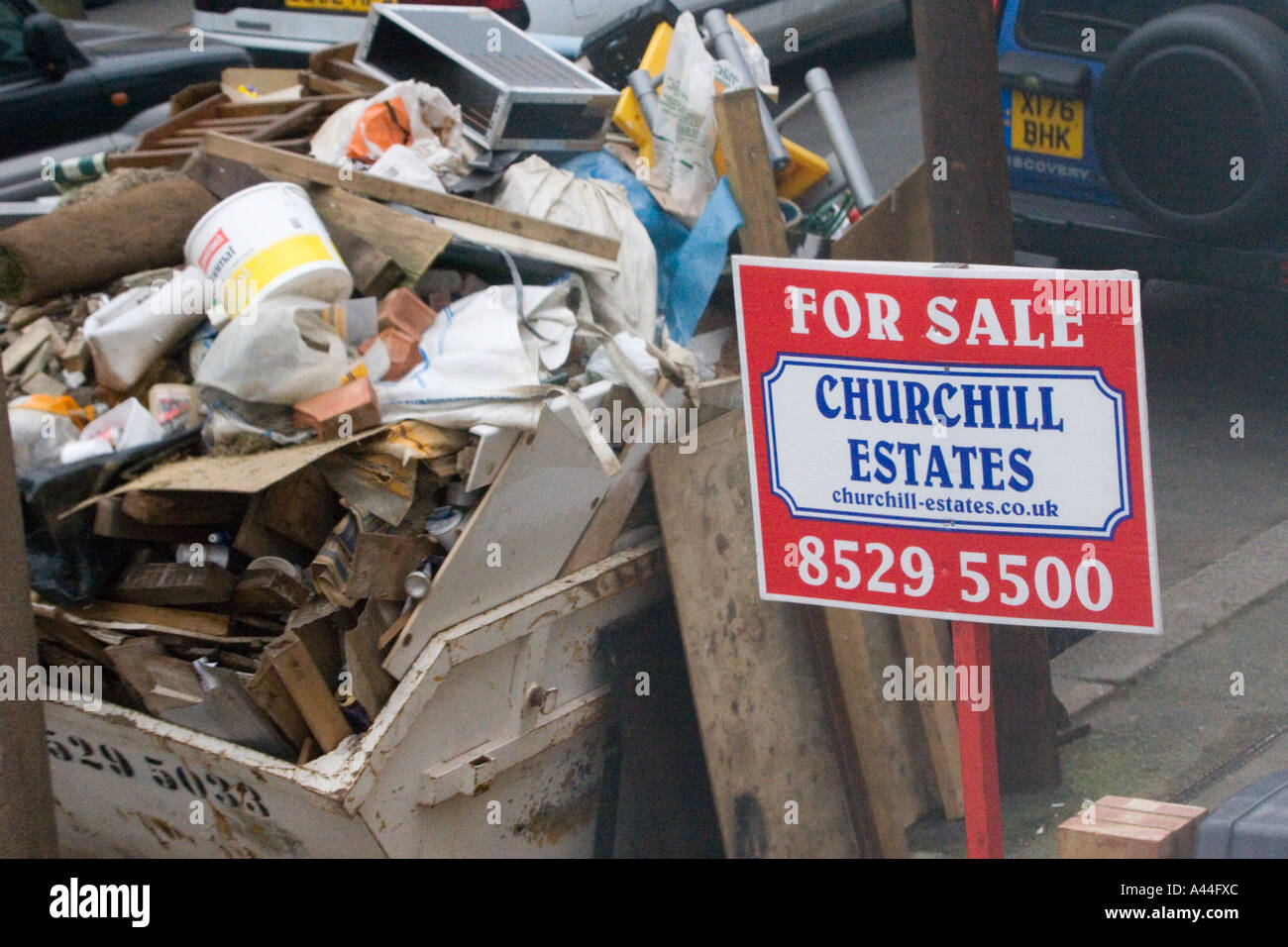 Overloaded skip in road hi-res stock photography and images - Alamy