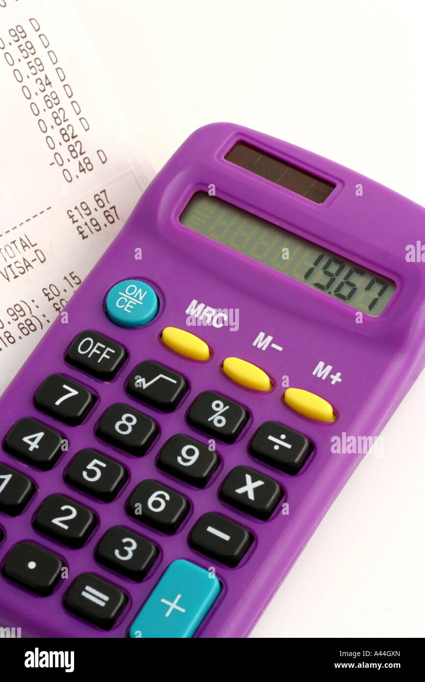 Pocket calculator and till receipt Stock Photo - Alamy