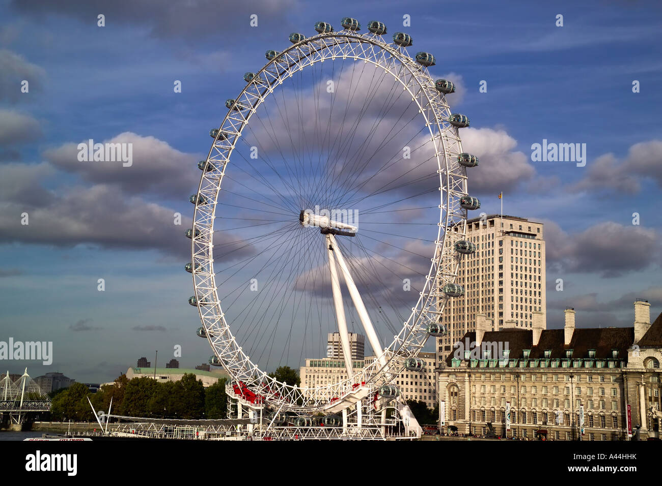 London Eye ferris wheel along the Thames River in London England Stock ...