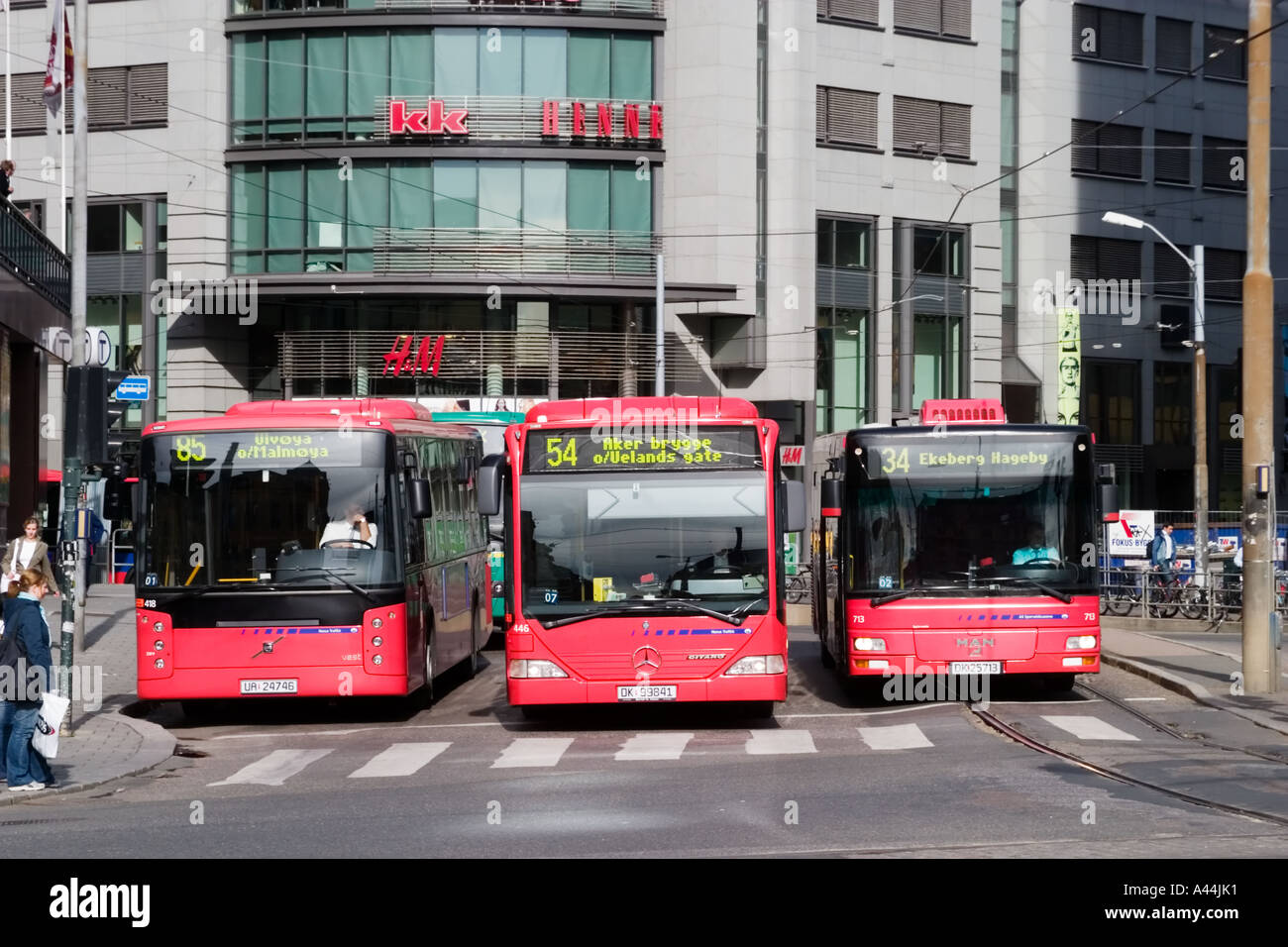 Three buses downtown Oslo Stock Photo - Alamy