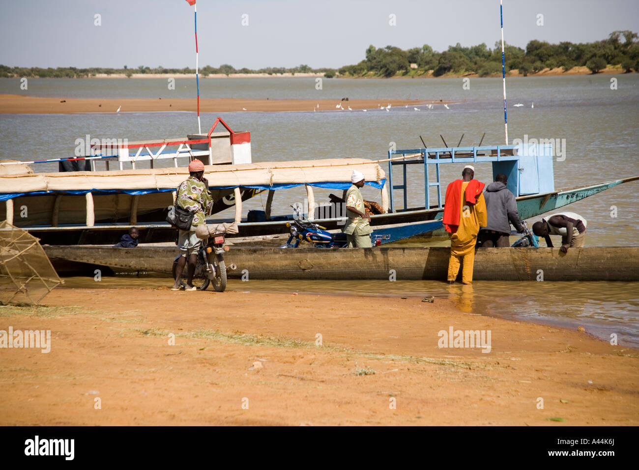 Catching a pirogue across the Bani river going home from the Monday ...