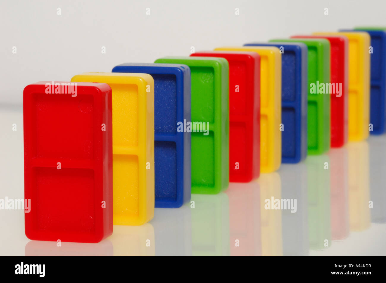 Line of dominoes Stock Photo - Alamy