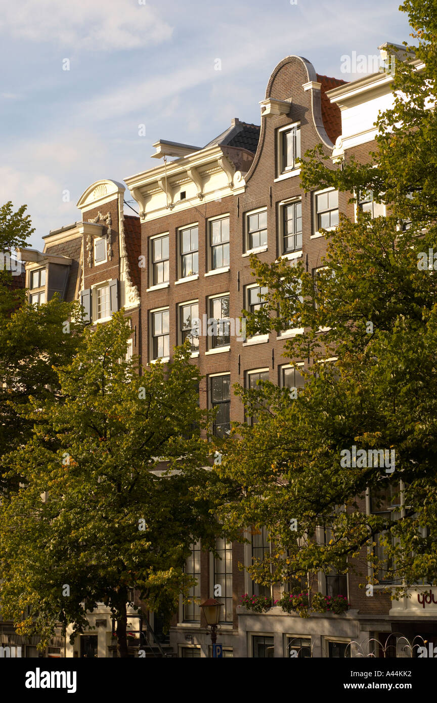 Traditional canal houses, one with a neck gable and another with a bell ...