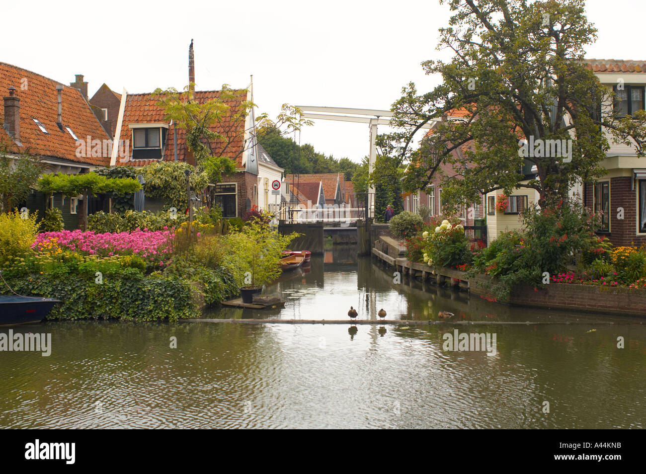 Wooden canal swing bridge in traditional Dutch Village. The Netherlands ...