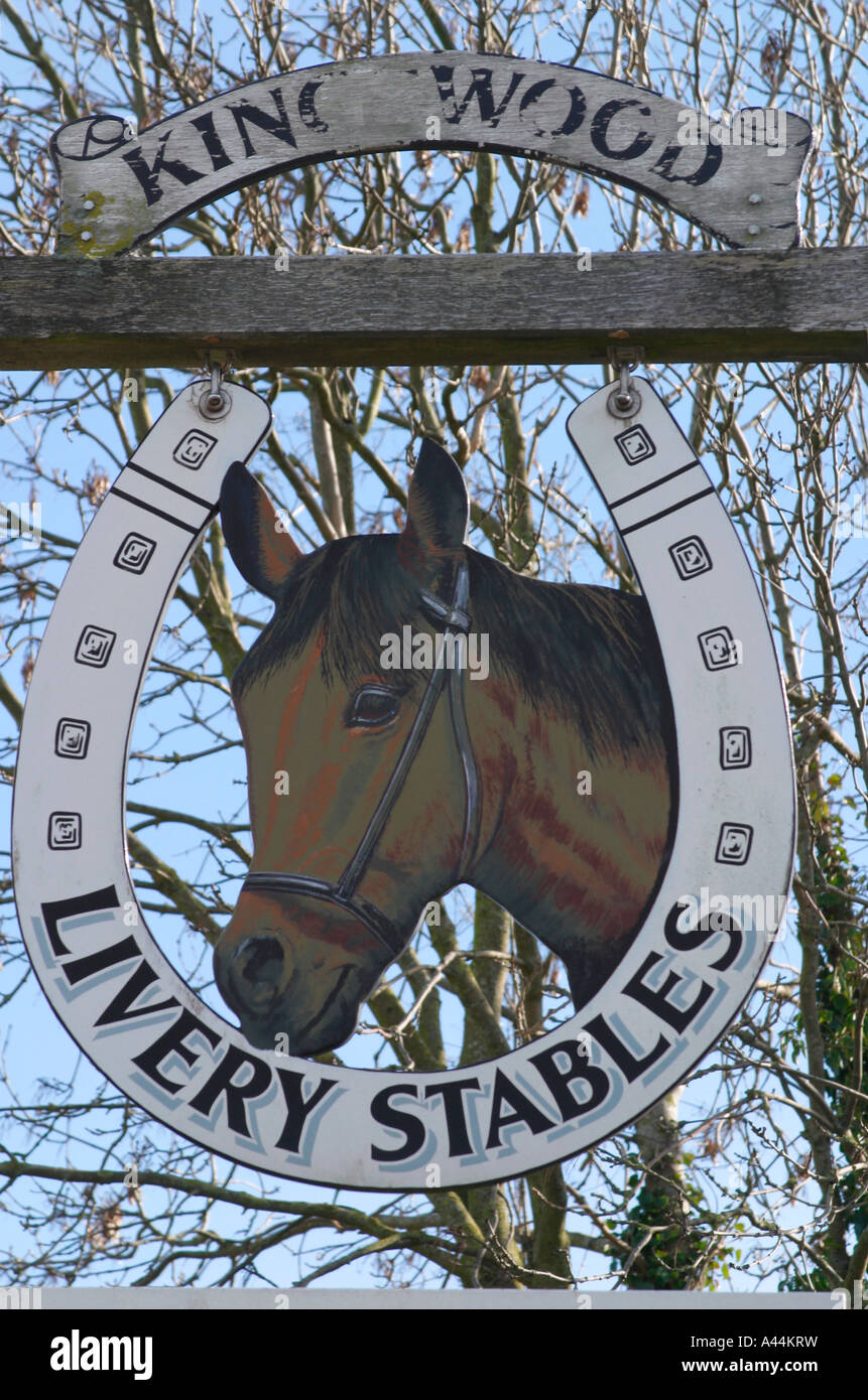 Painted wooden swinging sign advertising livery stables, west Sussex ...