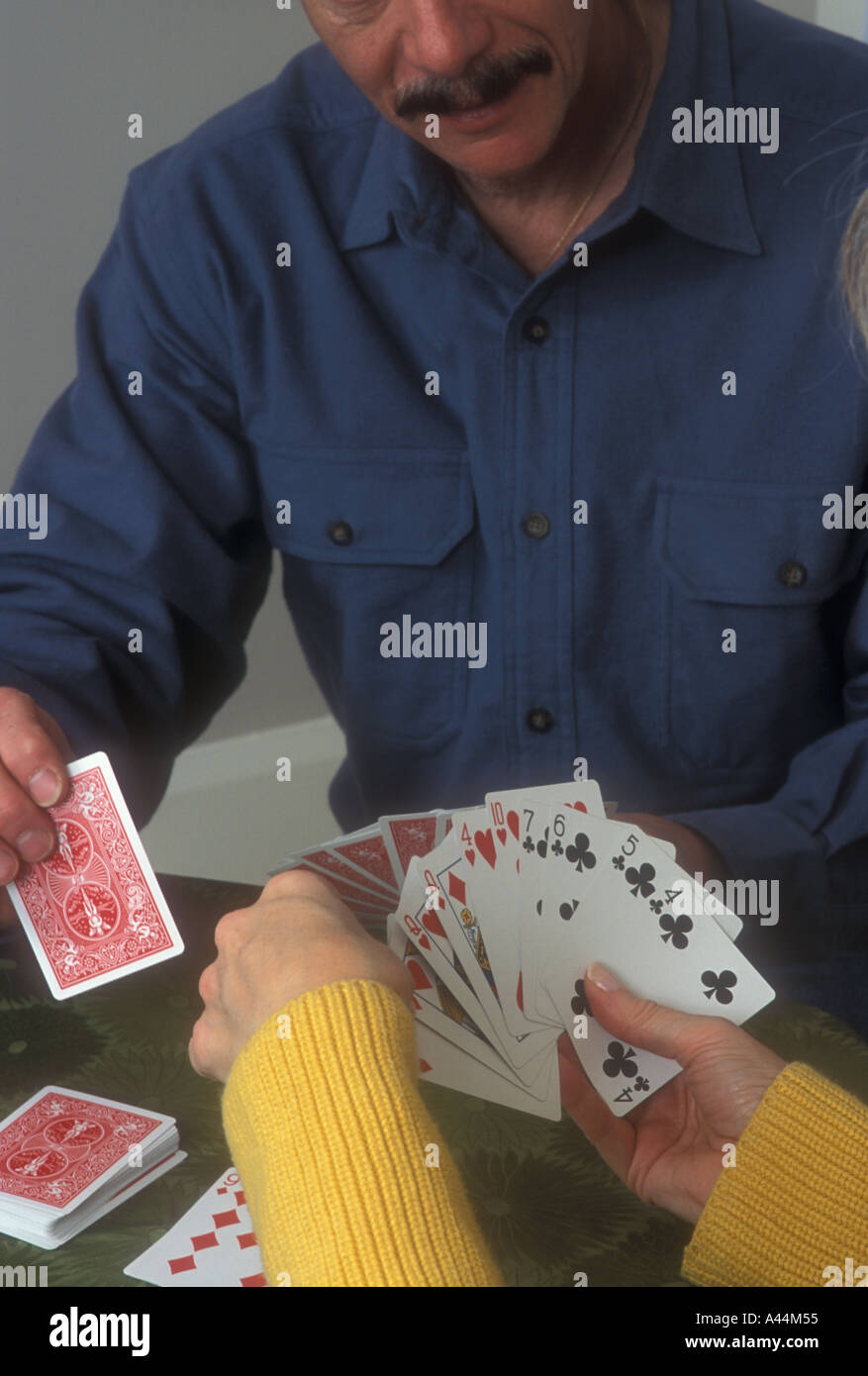 Looking at cards hold cards hi-res stock photography and images - Alamy