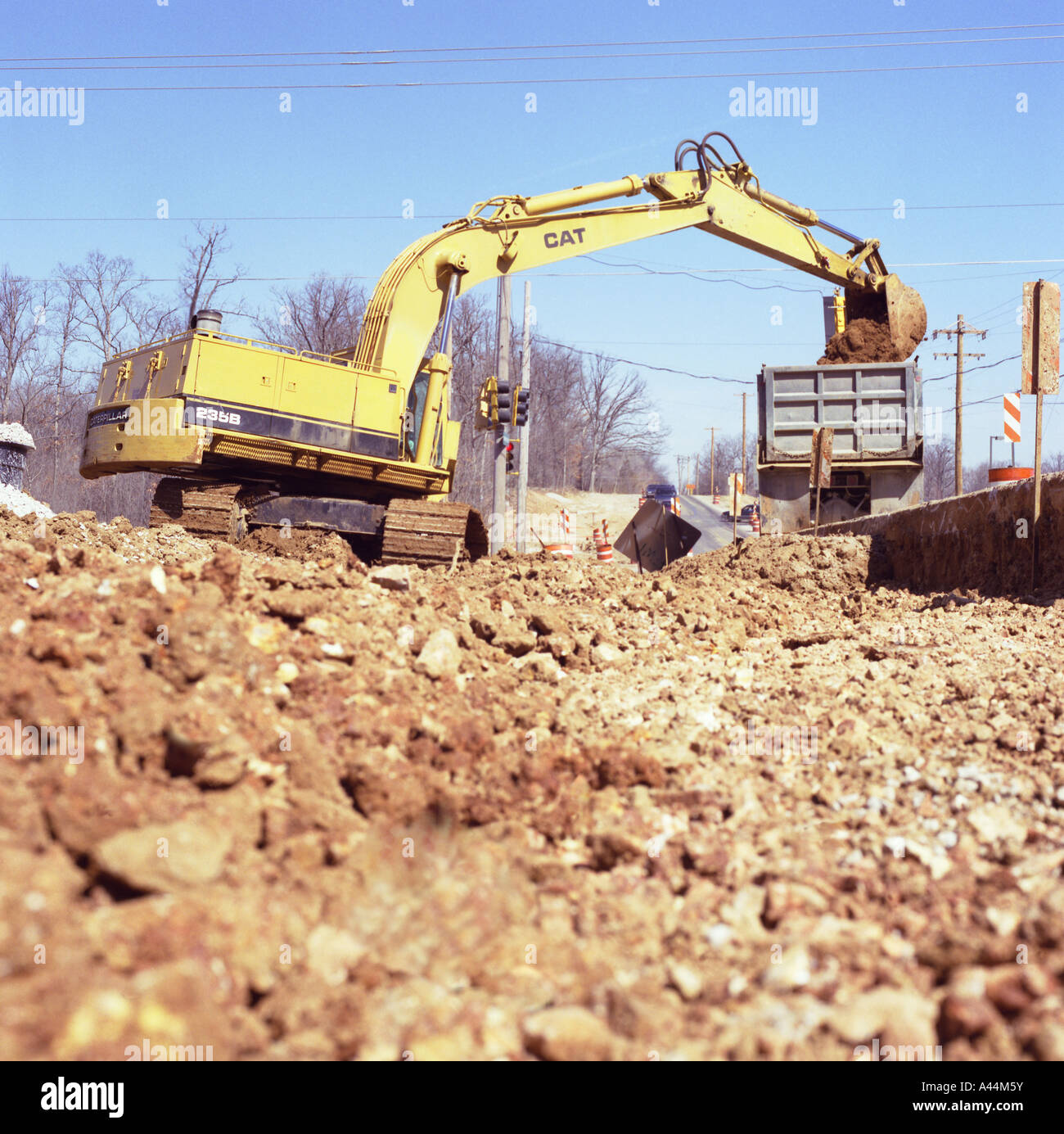 Excavator loading fill dump truck hi-res stock photography and images ...