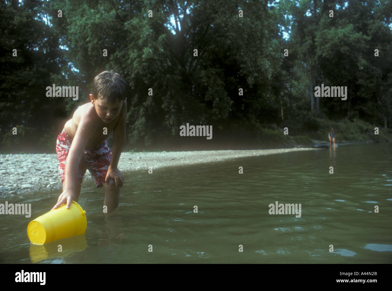 Playing in a River Stock Photo - Alamy