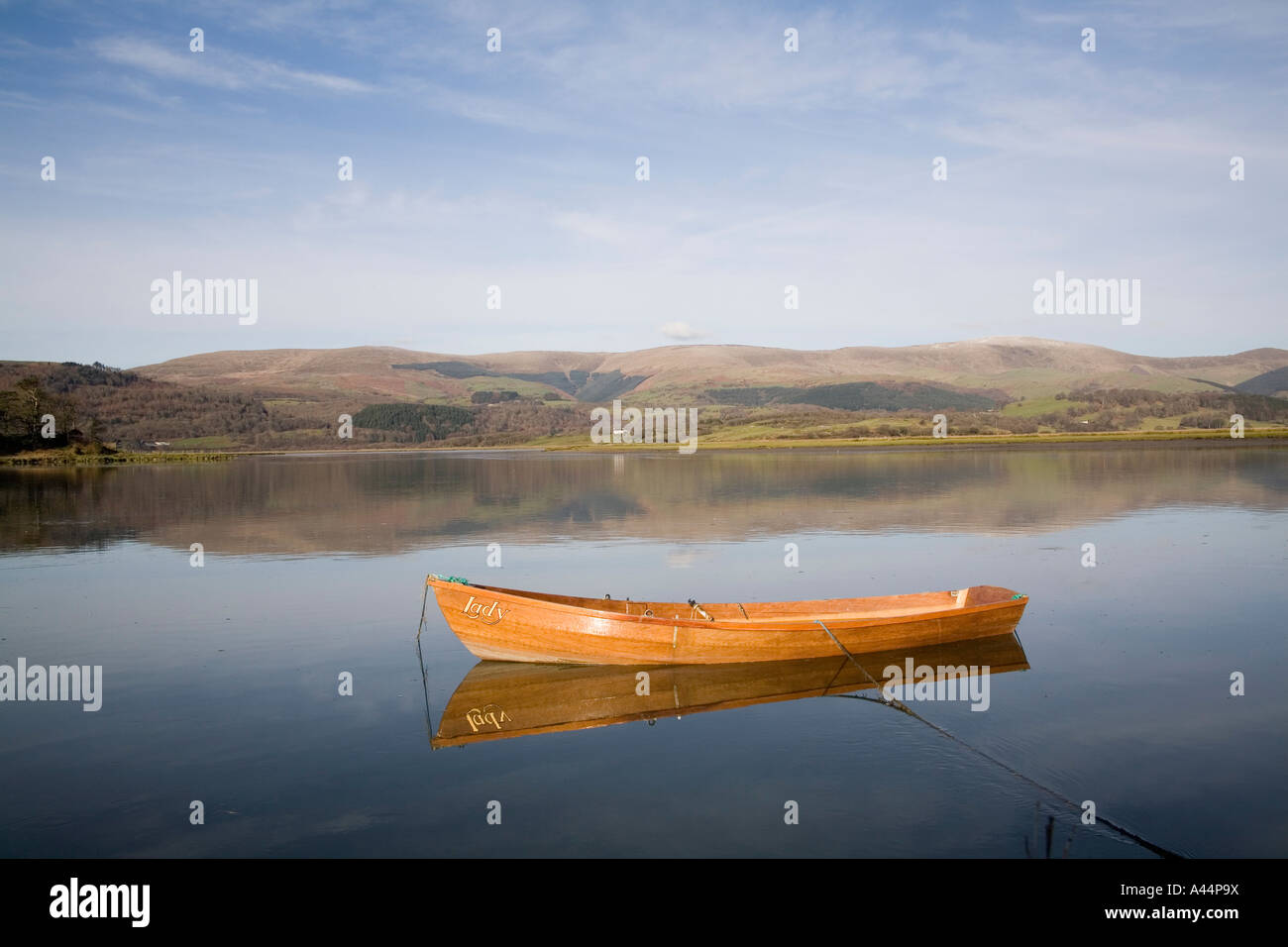GLANDYFI CEREDIGION MID WALES UK January A brown rowing boat is moored ...