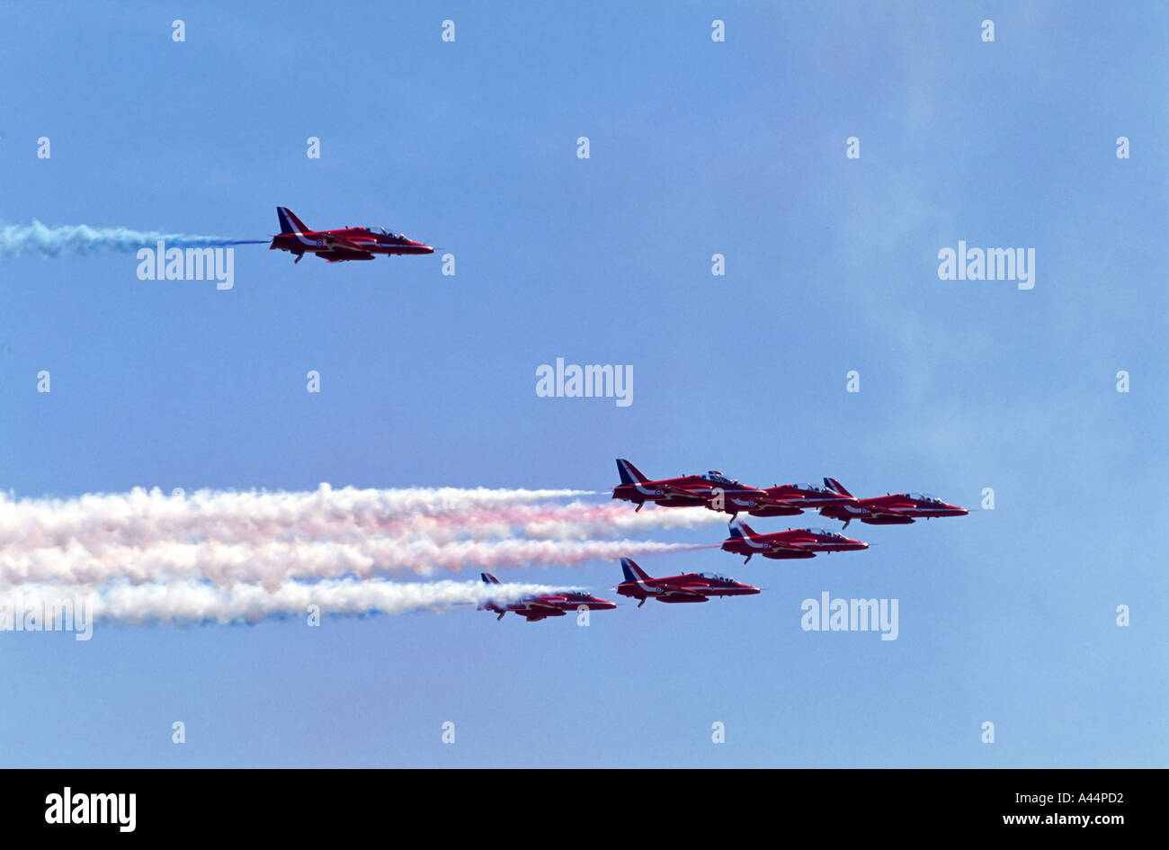 RAF Red Arrows display team flying with six aircraft in close formation ...