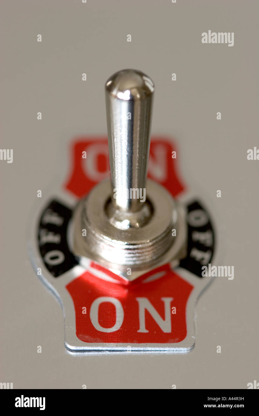 Abstract graphic image of an electric toggle switch on a shiny silver ...