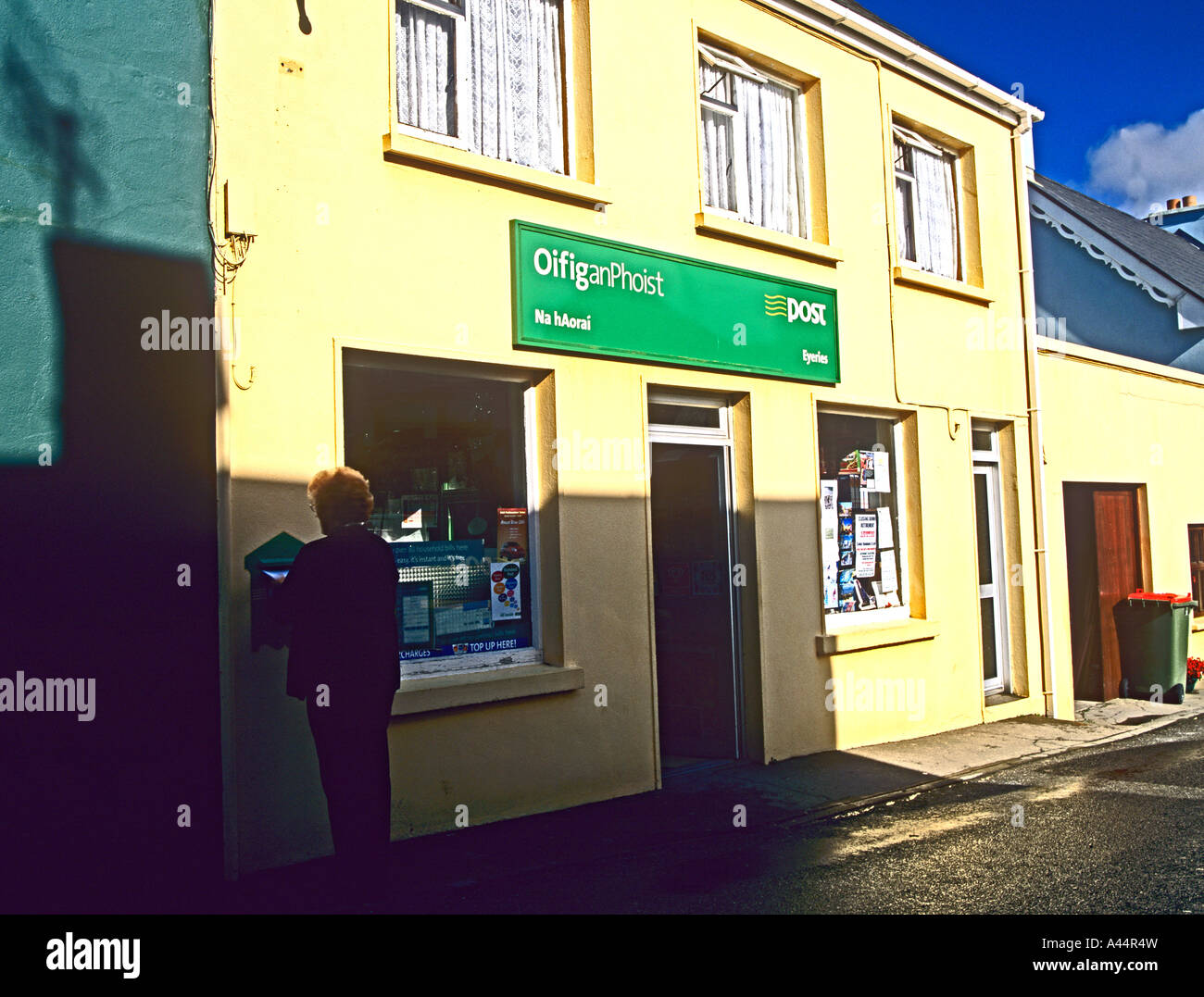 Woman posting letter in post hi-res stock photography and images - Alamy