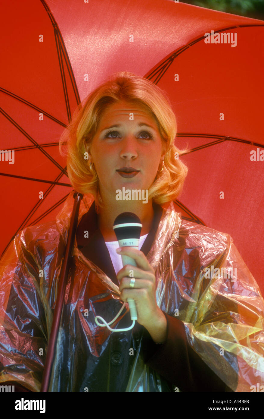 Weather reporter rain hi-res stock photography and images - Alamy