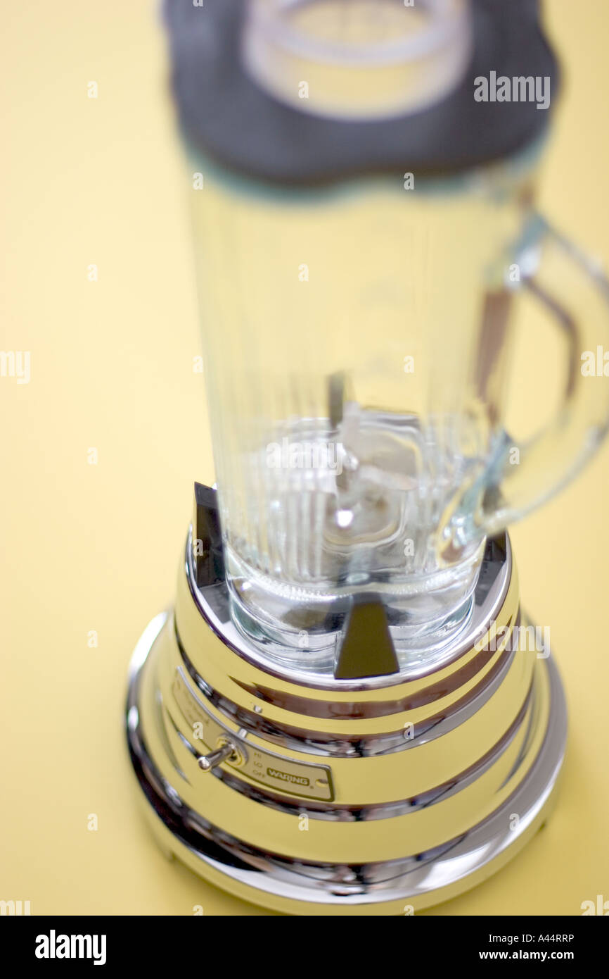 Food processor blender on simple yellow abstract background Stock Photo ...