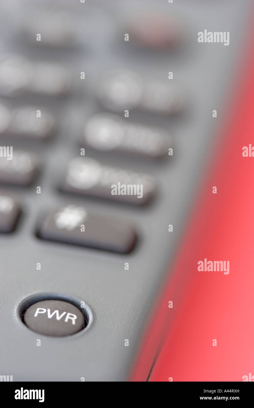 Closeup of power switch on sleek modern digital cordless phone on ...