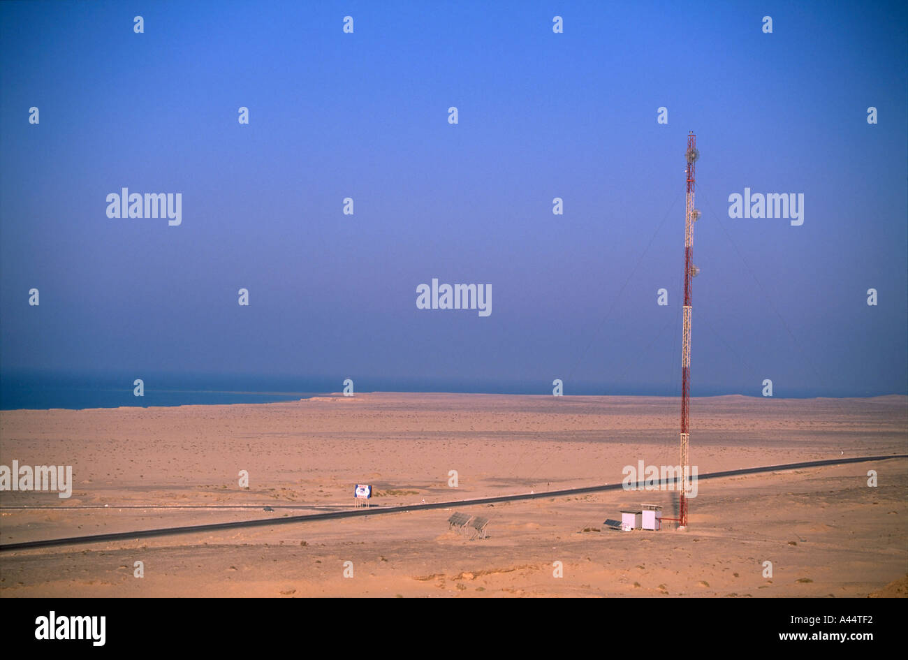 tall roadside solar powered radio transmitter mast near coast of Red ...