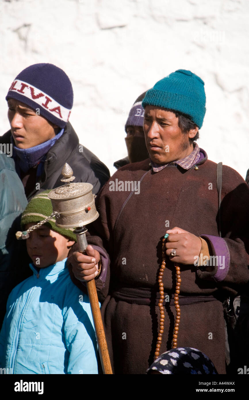 India Ladakh Leh Spitok Festival Ladakhi man spinning prayer wheel ...