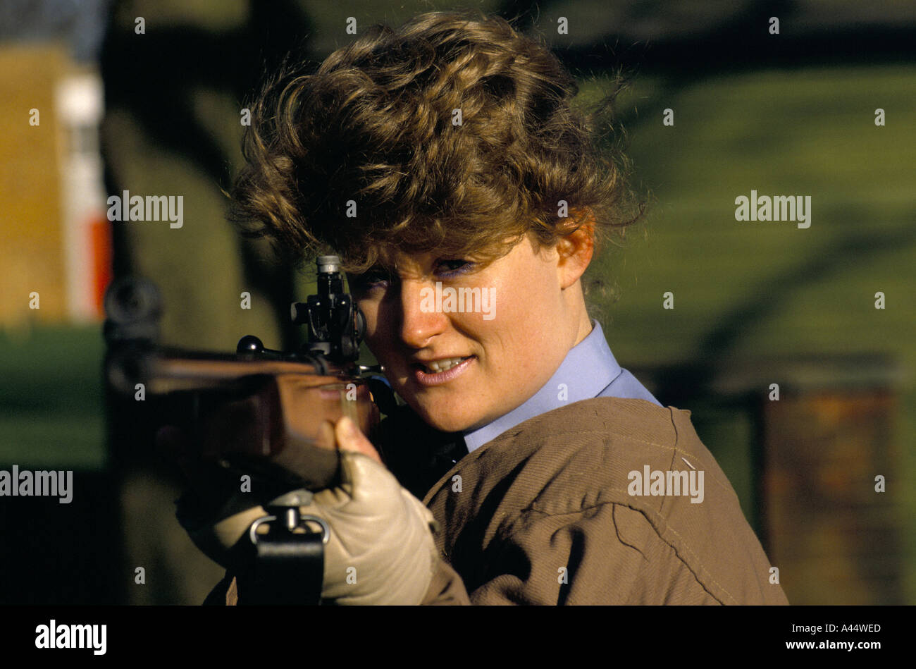 woman aiming with rifle female forces and rifles school Stock Photo - Alamy