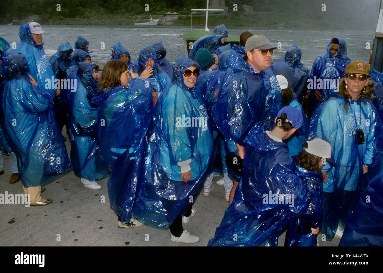 Tourists Wearing Blue Polythene Coats, To Protect Them From The Waters ...
