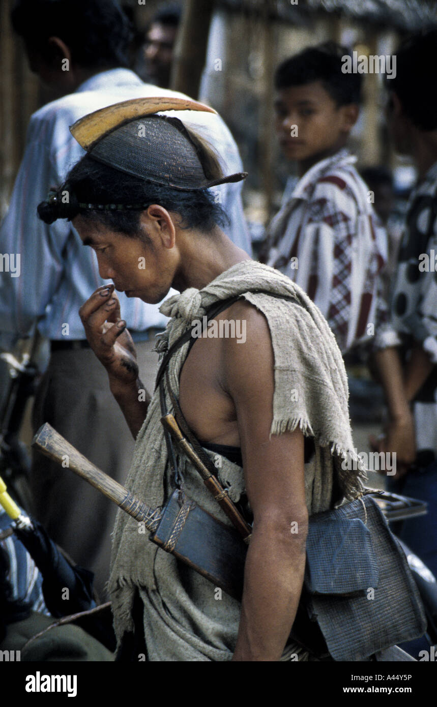A portrait of a man from the Nishi Tribe in Arunachal Pradesh India ...