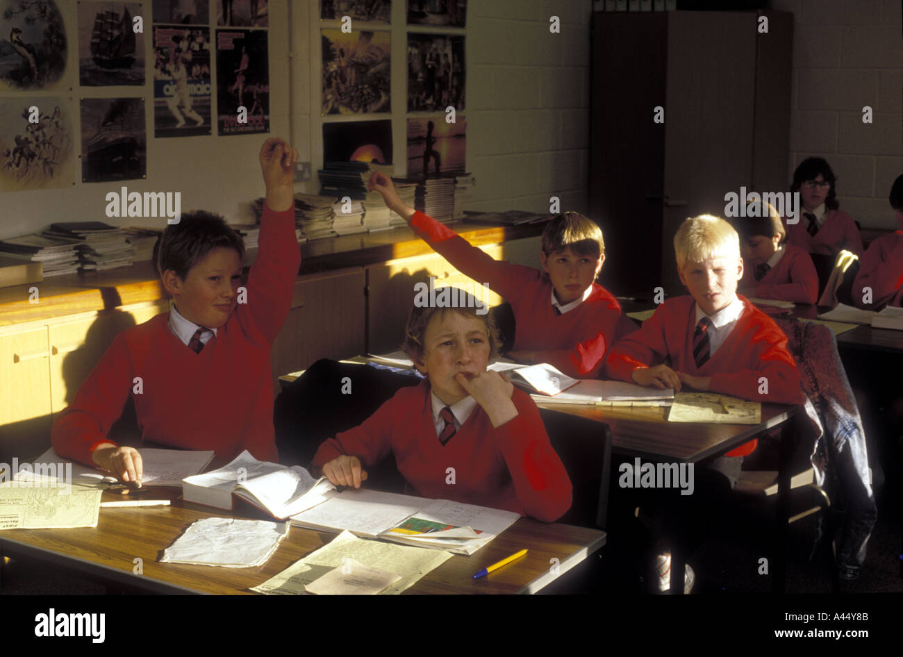 pupils answering questions during lessons at a rural comprehensive ...