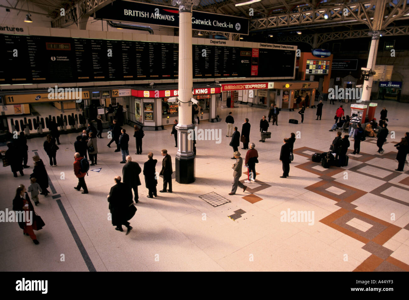 railway stations london victoria commuters wait for trains 2000 2000 ...