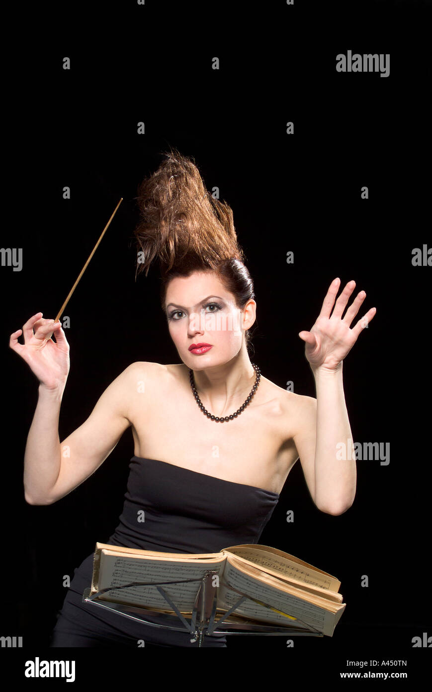 Conductor baton sheet music hi-res stock photography and images - Alamy