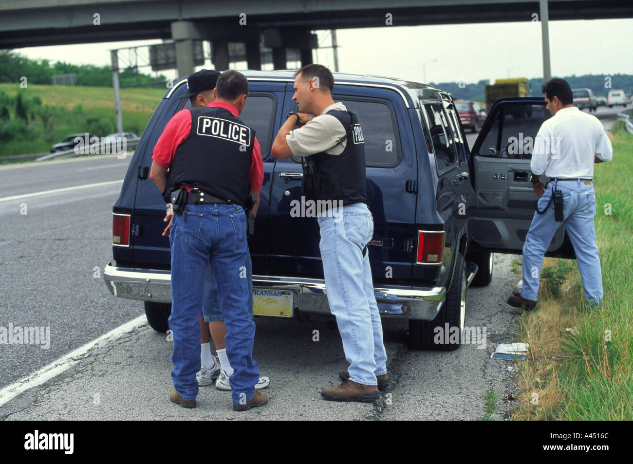Police frisking hi-res stock photography and images - Alamy