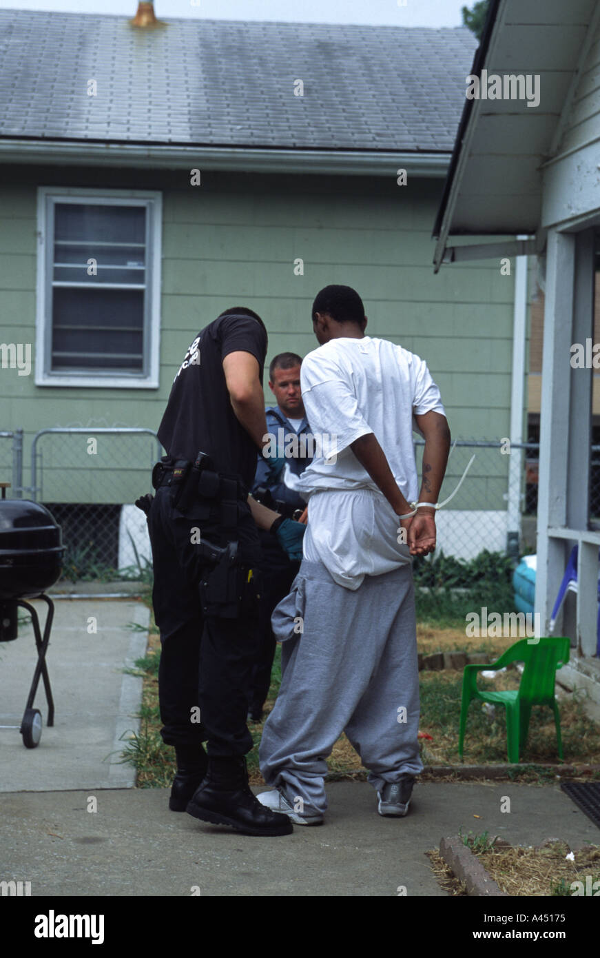 Police officer frisking suspect. Kansas City, MO, PD, USA. Gang Squad ...