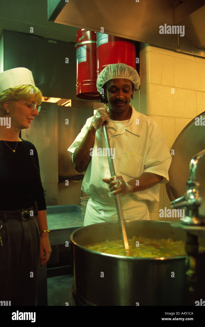 Inmate working in prison kitchen hi-res stock photography and images ...