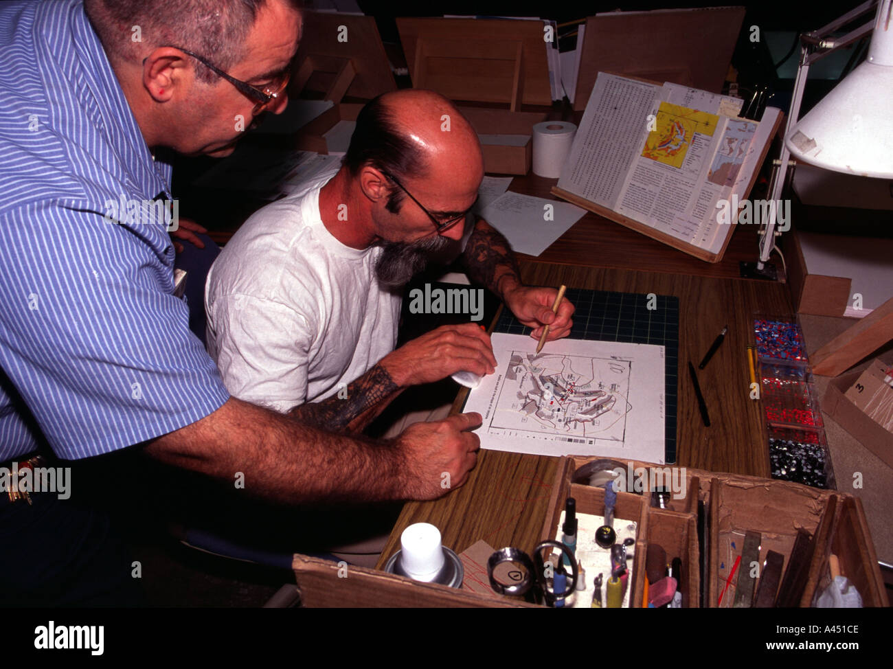 Prison work program Inmate making Braille map. Nebraska State ...