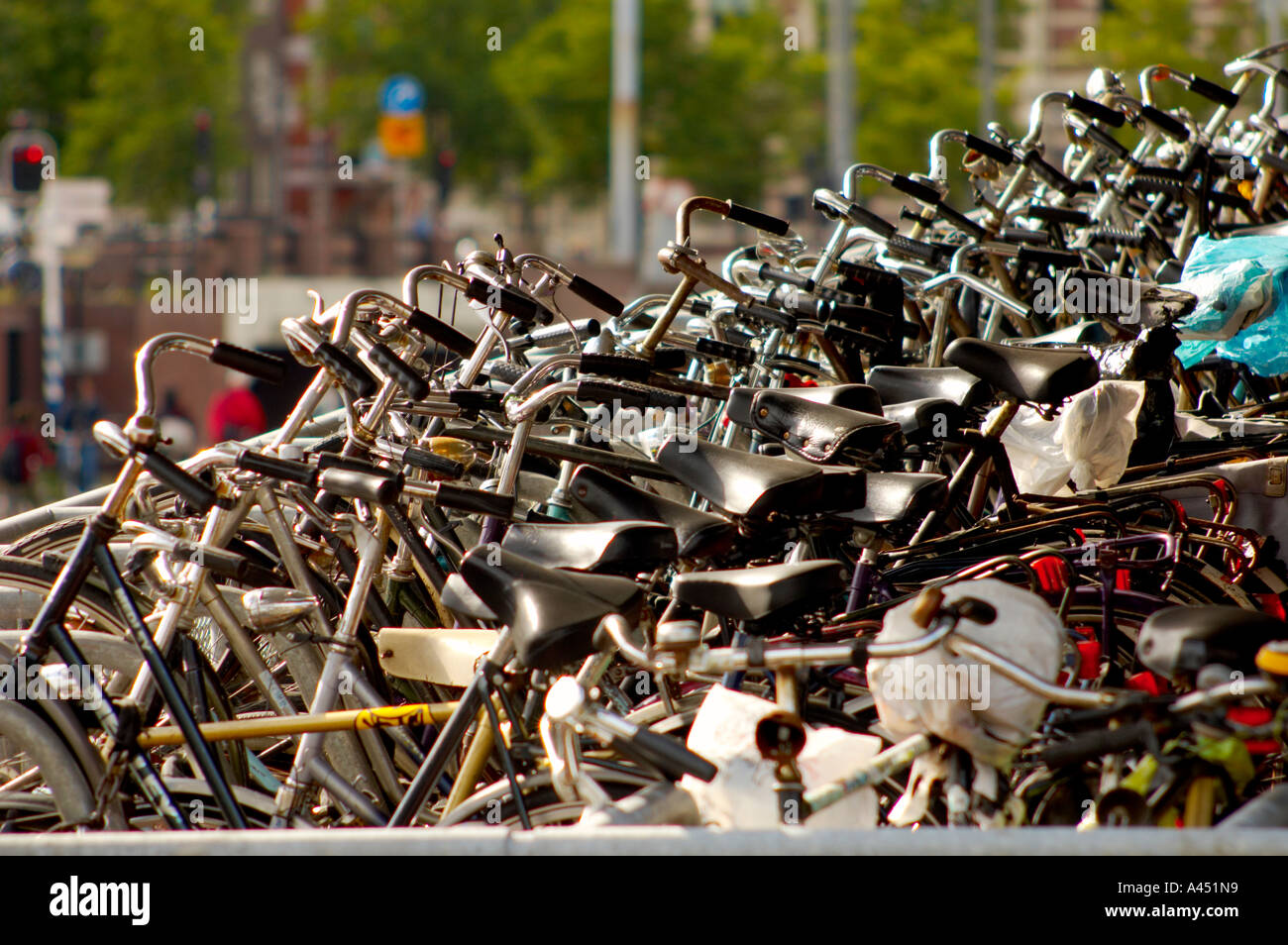 Bikes in racks Amsterdam Holland Stock Photo - Alamy