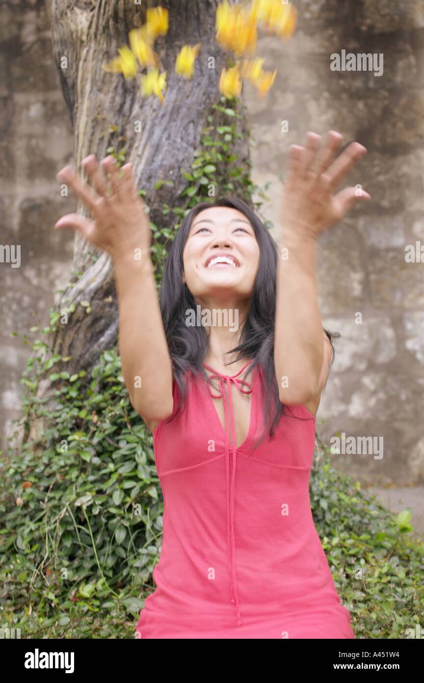 Throwing flowers in the air hi-res stock photography and images - Alamy
