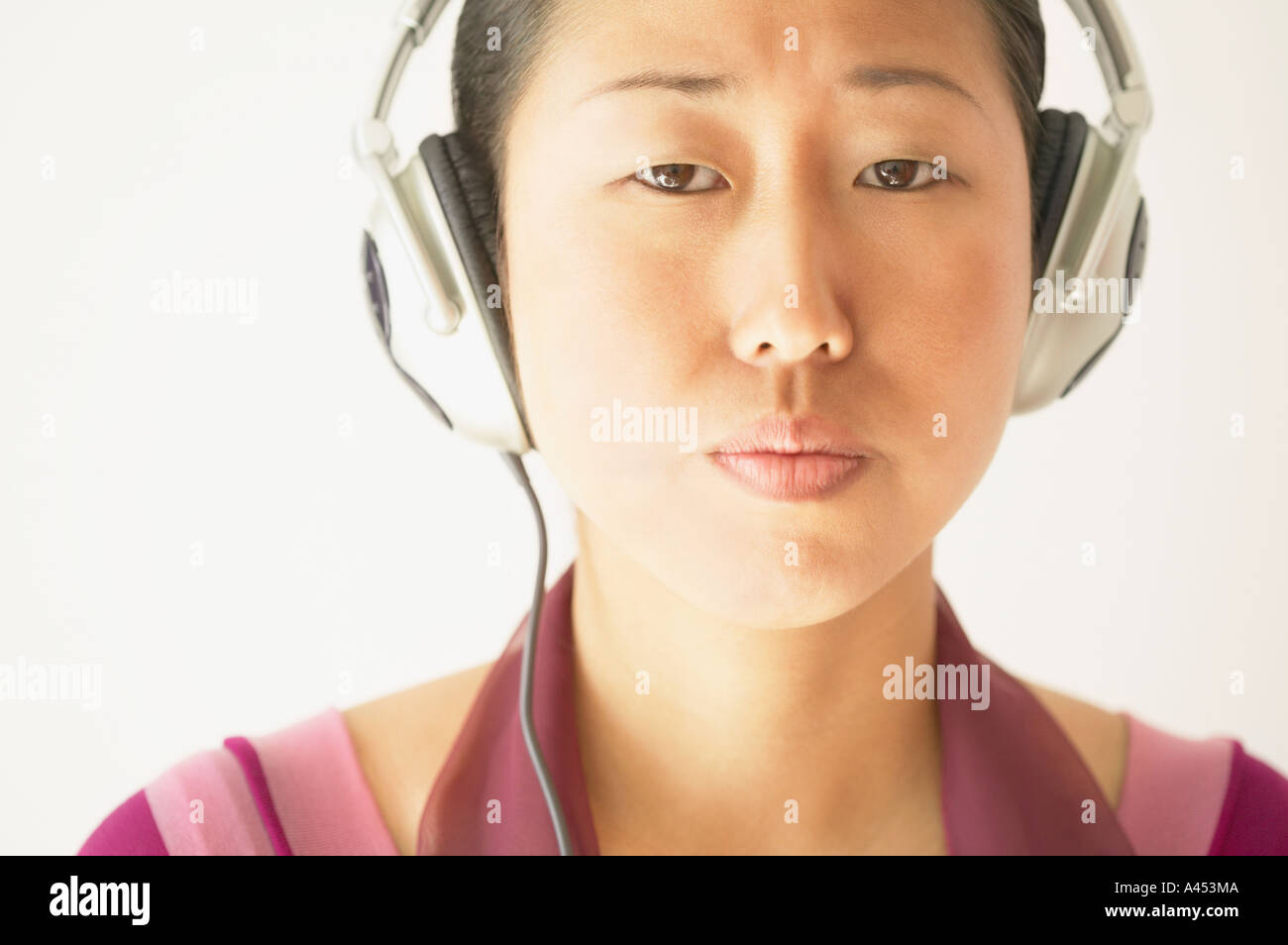 Woman listening to music Stock Photo - Alamy