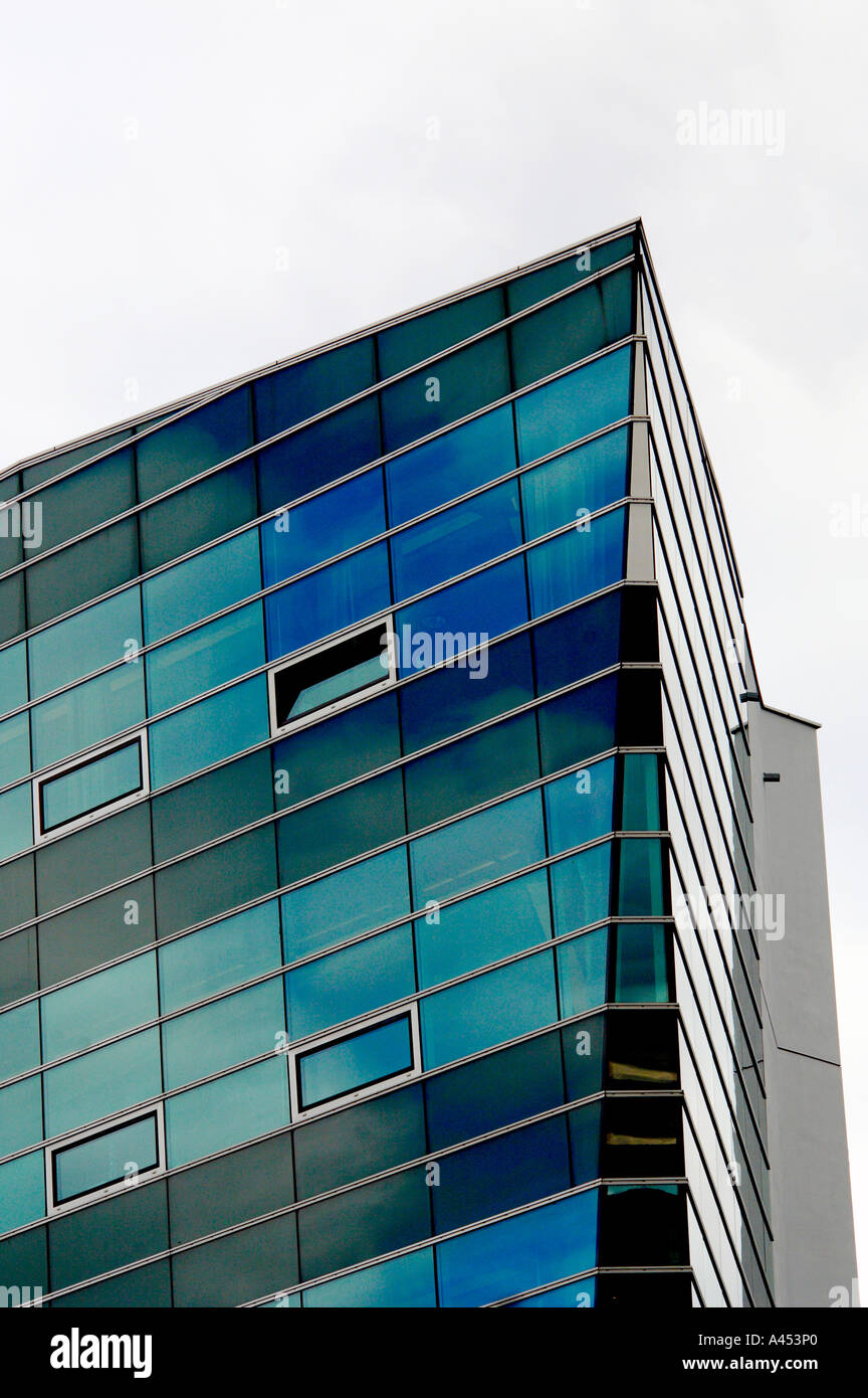 Modern Dutch building partially glazed with blue and green glass. in ...