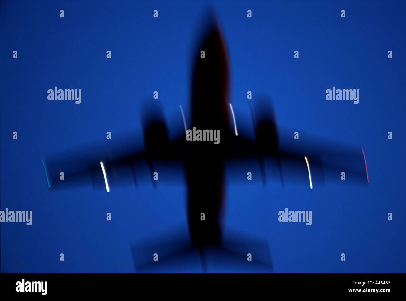 Graphic image of 727 upon take off during evening hours Stock Photo - Alamy